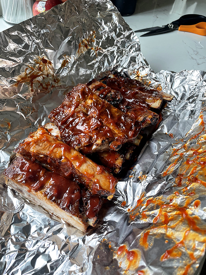 Behold, the star of the show! These ribs are so tender, they practically fall off the bone with a stern look. Napkins are not optional.