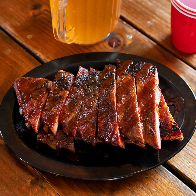 Meat candy for grown-ups. These ribs sport the kind of bark and smoke ring that would make a pitmaster weep with joy.