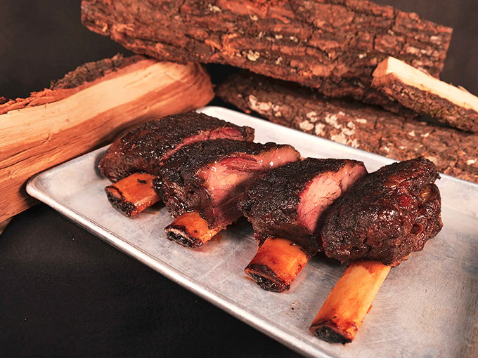 Behold, the star of the show! These ribs aren't just fall-off-the-bone tender; they're practically doing a striptease on your plate.