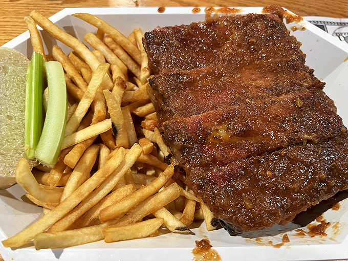 Behold, the carnivore's dream! These ribs aren't just fall-off-the-bone tender; they're practically jumping onto your fork with enthusiasm.