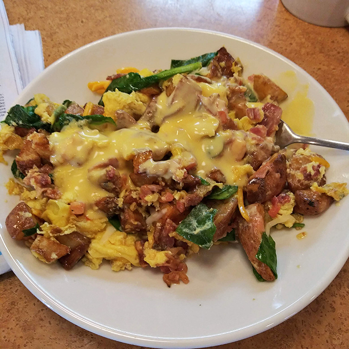 Breakfast of champions! This scramble is so loaded, it could probably bench press your morning blues away.