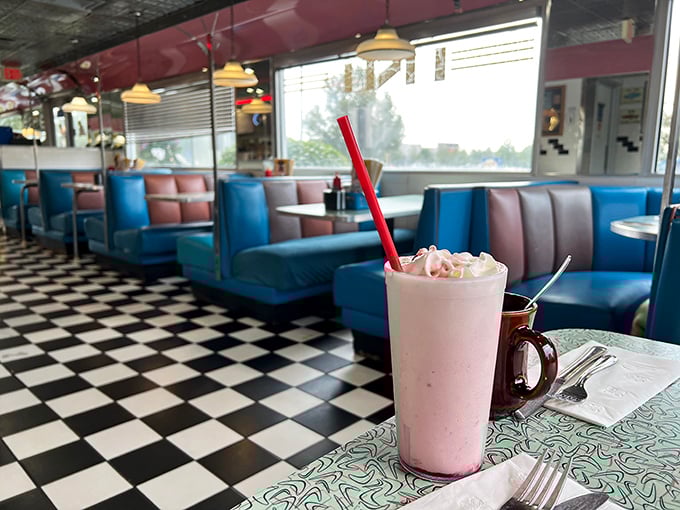 Pink perfection in a glass! This strawberry milkshake is so thick, you might need a spoon... and a nap afterward.
