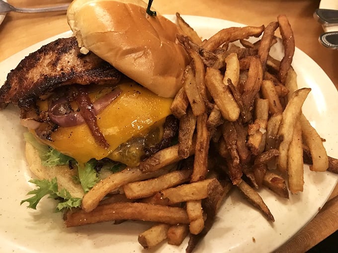 Meet "The Canadian" - a burger so hearty, it could make a Mountie weep with joy. Topped with an egg, it's breakfast and lunch in one delicious package.