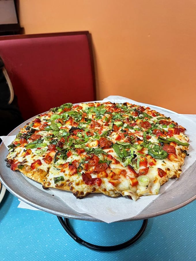 Holy moly, it's a pizza-naan love child! This Tikka Masala pizza is what happens when Italy and India have a delicious culinary affair.