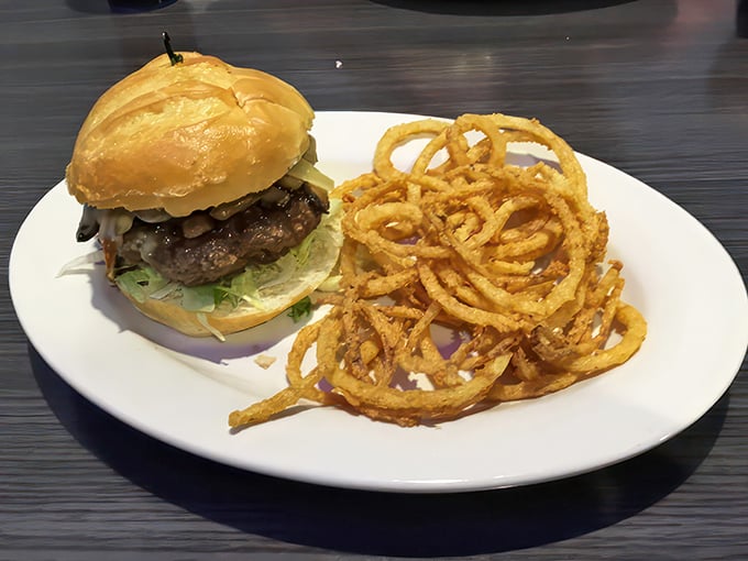 Behold, the Triple B Classic with a side of onion rings. It's a tower of flavor that would make the Leaning Tower of Pisa jealous.