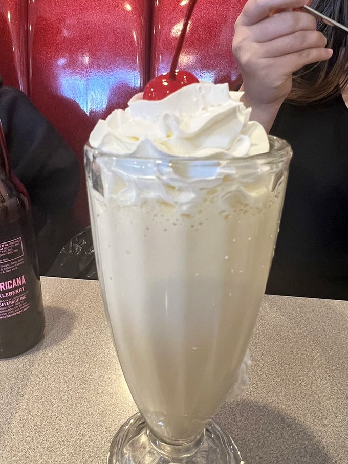 Cloud nine in a glass! This vanilla caramel shake isn't just a drink&mdash;it's a creamy dream topped with a cherry on cloud nine.