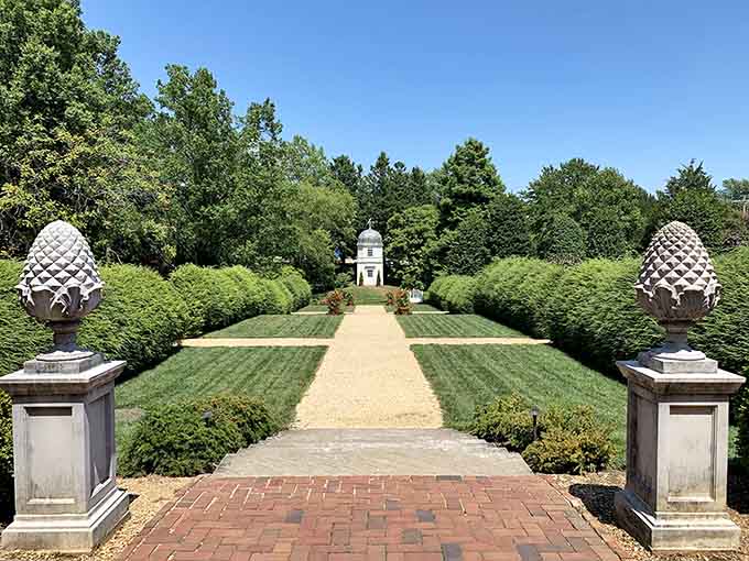 Garden of earthly delights: Where topiaries dance and history blooms. This manicured marvel would make even Martha Stewart swoon with envy.