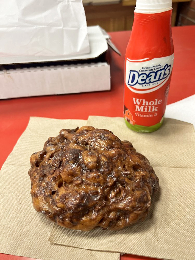 The holy grail of fried dough&mdash;a proper apple fritter paired with cold milk. This isn't breakfast; it's an edible hug for your soul.
