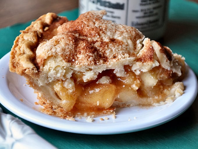 Holy apple pie, Batman! This slice is so packed with cinnamon-kissed fruit, it's like autumn decided to throw a party in pastry form.