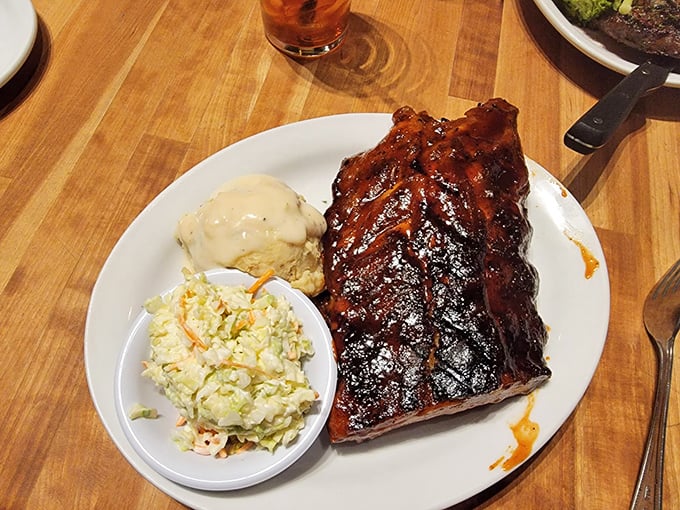 These baby back ribs don't just fall off the bone&mdash;they practically leap into your mouth, with those legendary mashed potatoes standing by for backup.