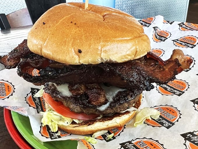 Holy cow! This bacon cheeseburger is so massive, it should come with its own zip code. Prepare for a delicious journey that might require a map and compass.