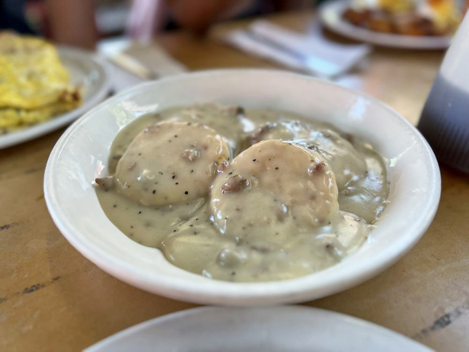 Gravy train coming through! These biscuits are so smothered in creamy goodness, they might need a lifeguard on duty.