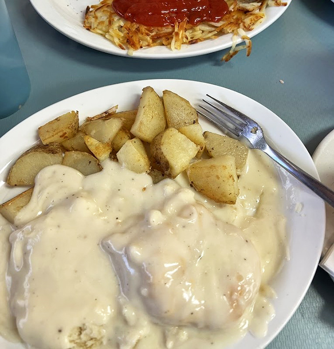 Gravy so good, you'll want to bathe in it! These biscuits and potatoes are the ultimate comfort food power couple.