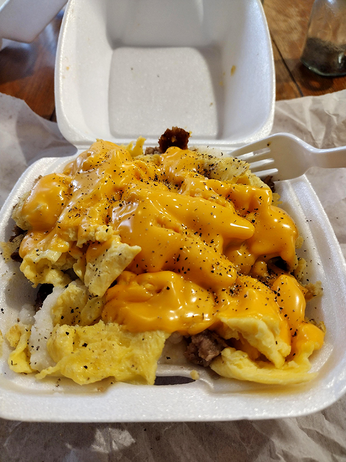 Eggs and cheese performing a golden tango on your plate. It's the kind of breakfast that makes roosters crow with envy.