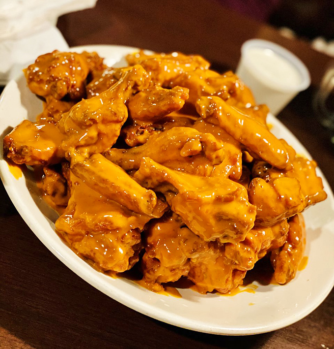 Holy mother of poultry! These aren't just wings; they're flavor bombs waiting to detonate. Napkins at the ready, folks &ndash; it's about to get messy.