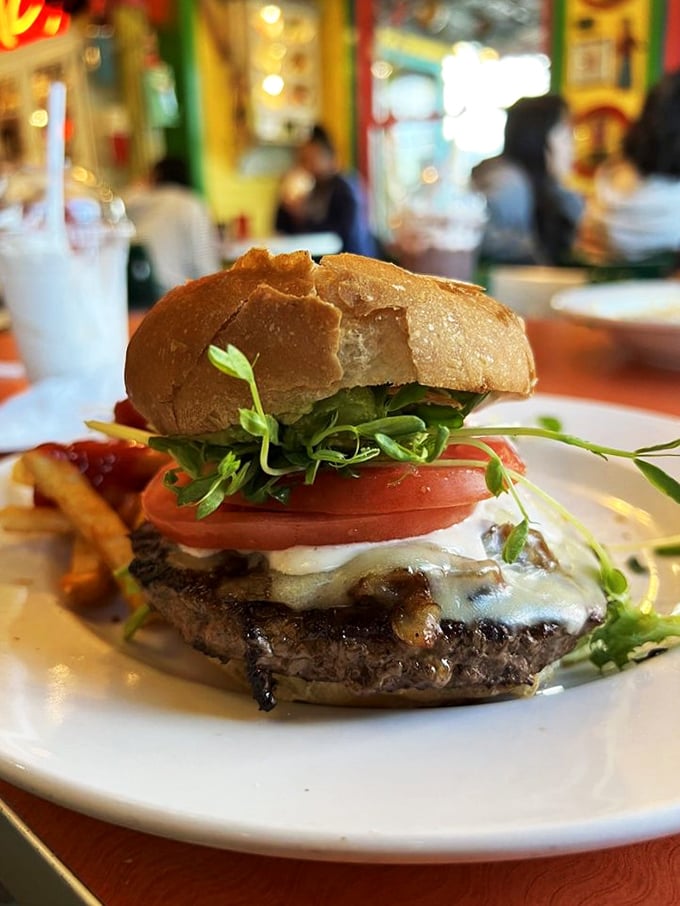 Burger bliss on a bun! This juicy masterpiece is stacked higher than my hopes for fitting into last year's jeans.