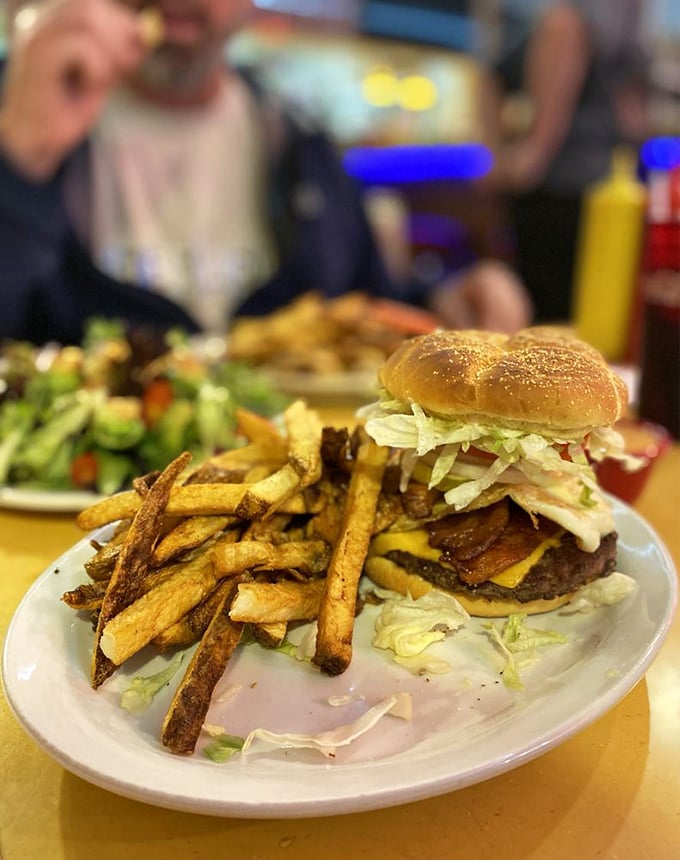 Burger bliss achieved! This towering masterpiece of beef and toppings is what fast food dreams it could be when it grows up.
