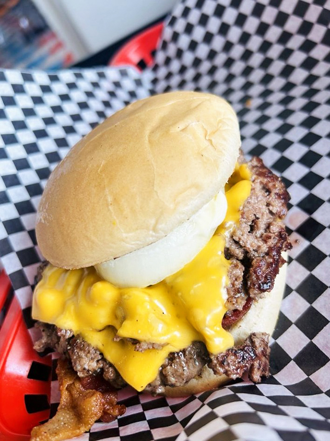 "Behold, the cheeseburger of your dreams! This beauty could make even the Mona Lisa crack a smile."