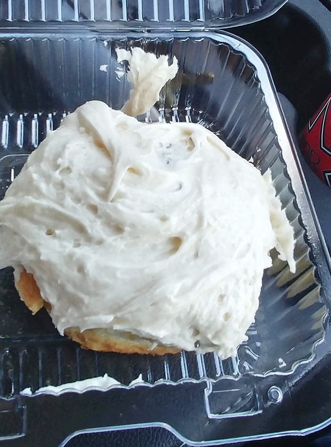 Behold, the cinnamon roll of your dreams! This frosted beauty is so big, it needs its own ZIP code.