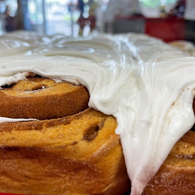 Holy cinnamon swirl, Batman! This gooey masterpiece is what dreams are made of. It's not just a roll, it's a warm hug for your taste buds.