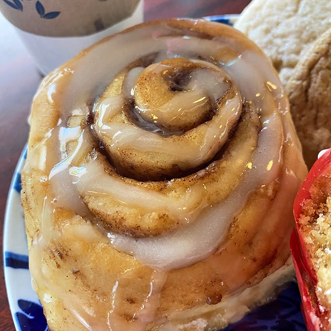 Behold, the cinnamon roll of your dreams! It's not just breakfast, it's a warm, gooey hug for your taste buds.
