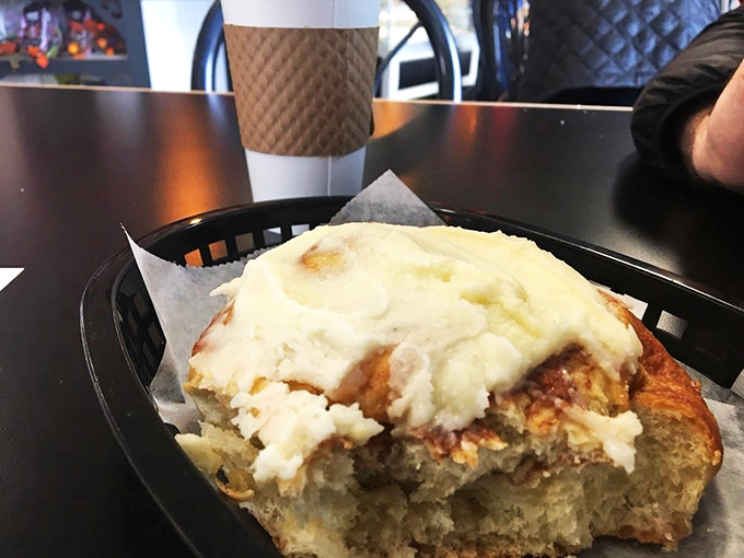 Behold, the crown jewel of carbs! This cinnamon roll is so generously frosted, it could double as a pillow for sweet dreams.
