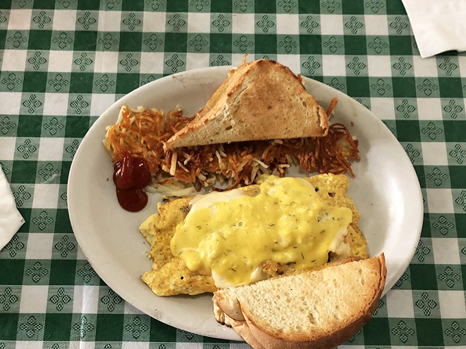 Behold, the Country Club Omelette! It's like a golf course decided to become breakfast - minus the plaid pants and plus extra cheese.