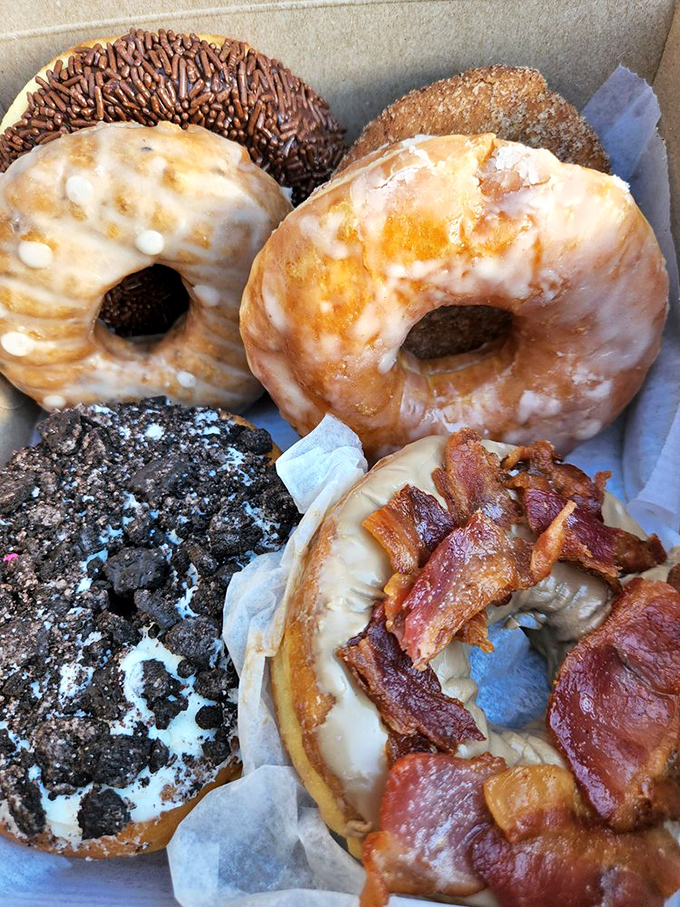 A box of joy, wrapped in cardboard! These donuts aren't just breakfast, they're a party waiting to happen on your taste buds.