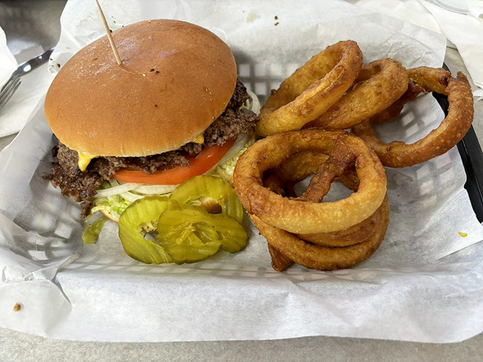 Behold, the double cheeseburger in all its glory! It's not just a meal, it's a work of art that belongs in the Louvre... of lunch.