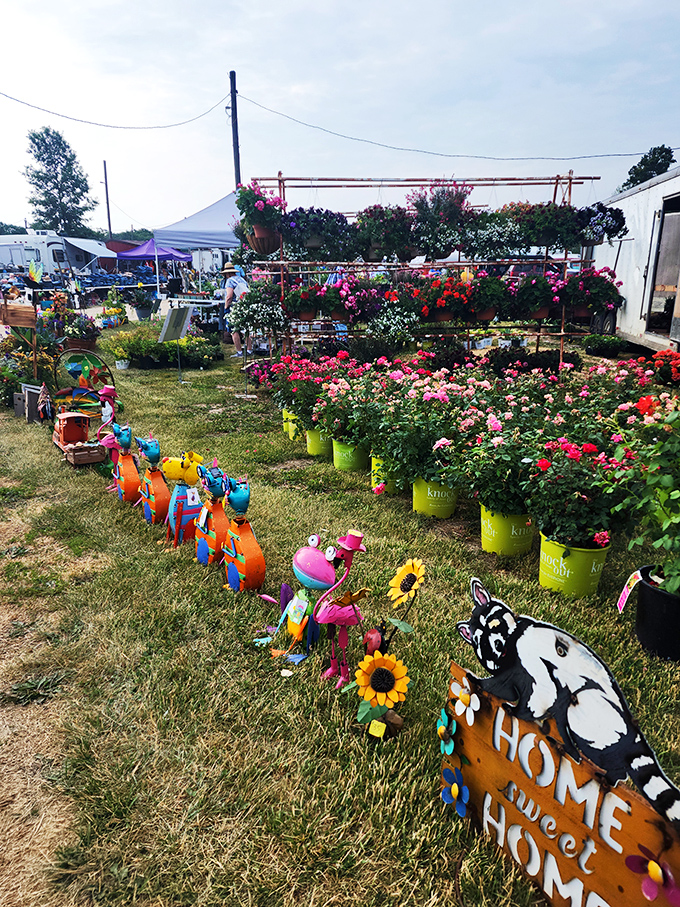 Bloom where you're planted! A riot of colors greets bargain hunters, with flowers and garden decor creating a cheerful oasis amidst the treasure trove.