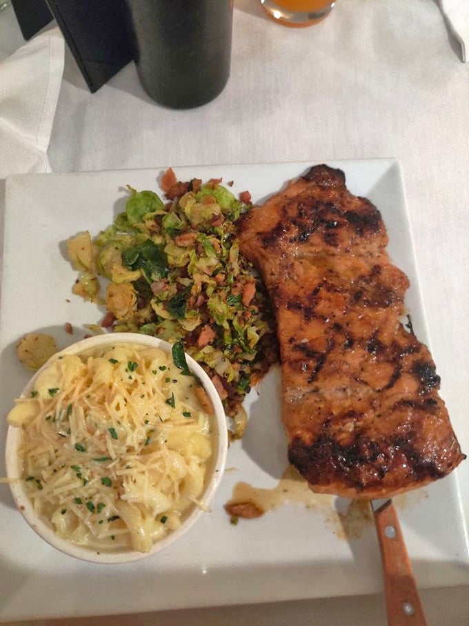 The star of the show: brown sugar rubbed pork tenderloin with perfectly caramelized edges alongside creamy mac and cheese and Brussels sprouts.