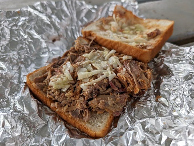 Barbecue bliss on bread! This sandwich is so packed with juicy, smoky pork, it's like the bread is just there for moral support.