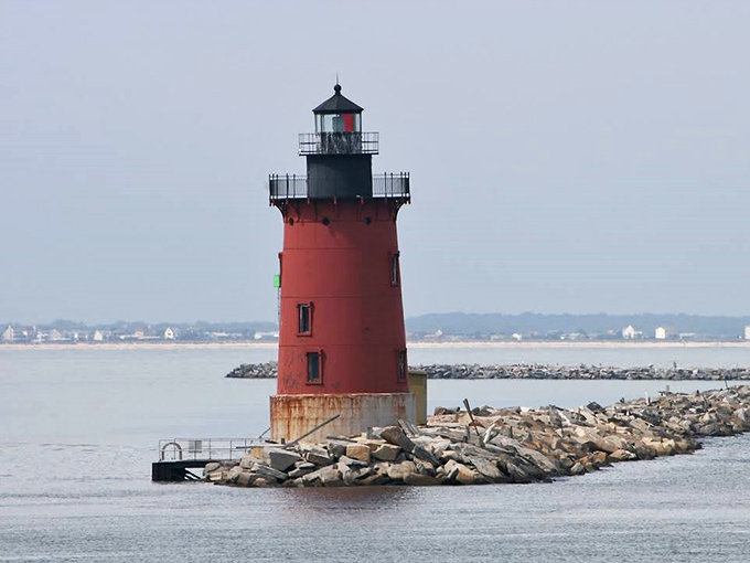 Lighthouse love affair: Standing tall and proud, this crimson beacon has been guiding ships and stealing hearts for generations.