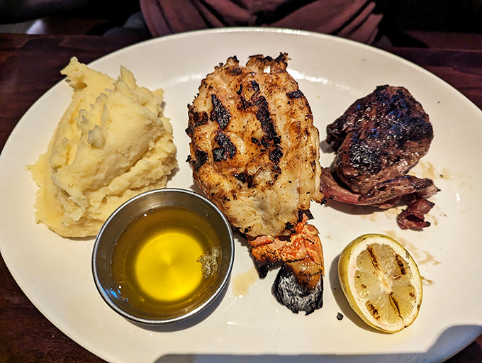 Behold, the star of the show! This lobster tail is so perfectly grilled, it might just do a little dance right off your plate.