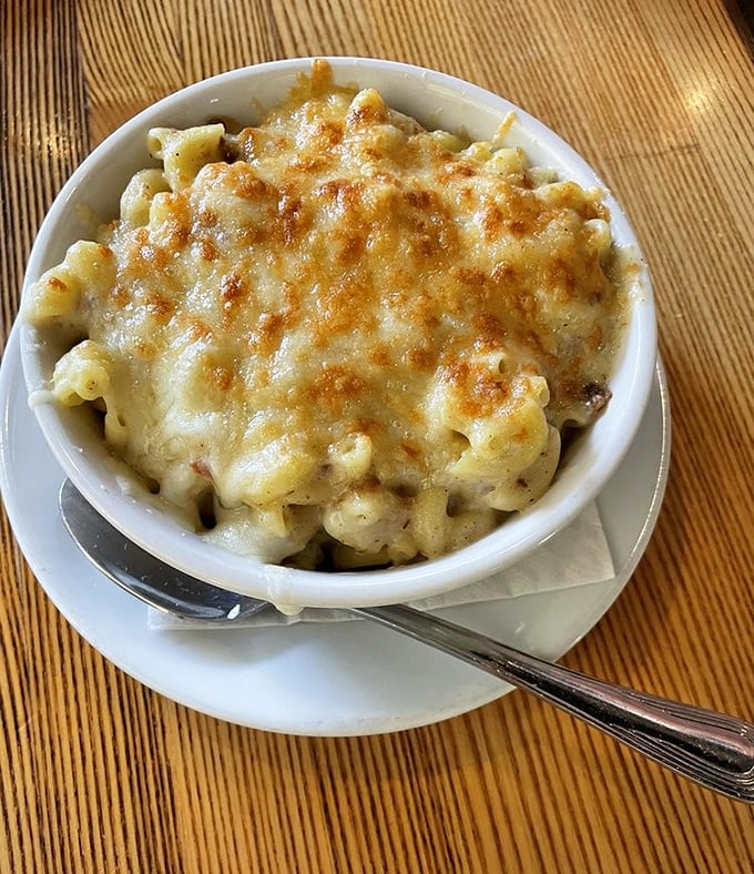 Golden, bubbling, and beckoning like a cheesy siren song, this mac and cheese doesn't need panoramic ocean views to be the star attraction.