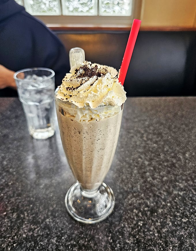 Holy moly, that's not a milkshake &ndash; it's a work of art! Topped with enough whipped cream to make a cloud jealous.