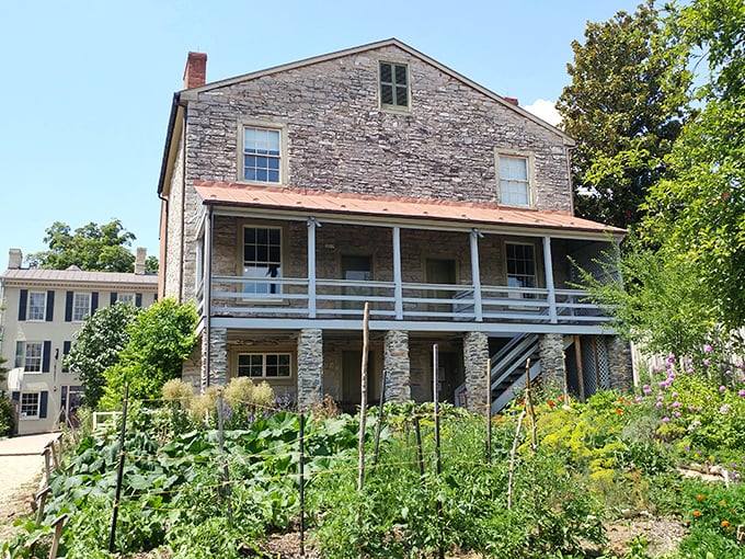 Stone walls and blooming gardens &ndash; a slice of the past preserved. This historic home invites you to step back in time.