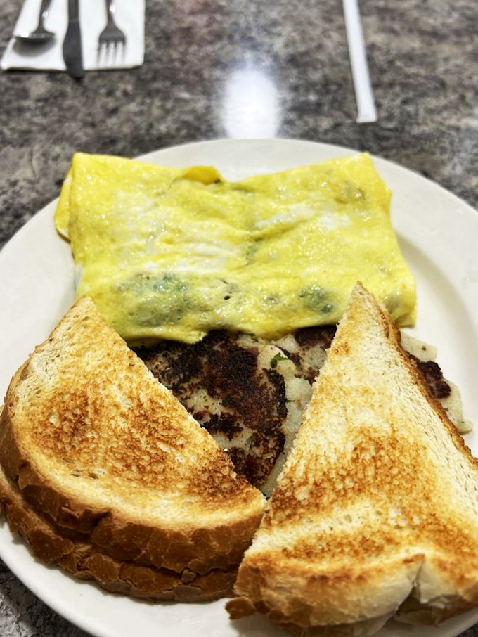 The "Omelette Overflow" - where eggs go to fulfill their higher purpose. It's so fluffy, it could double as a pillow for your food coma.