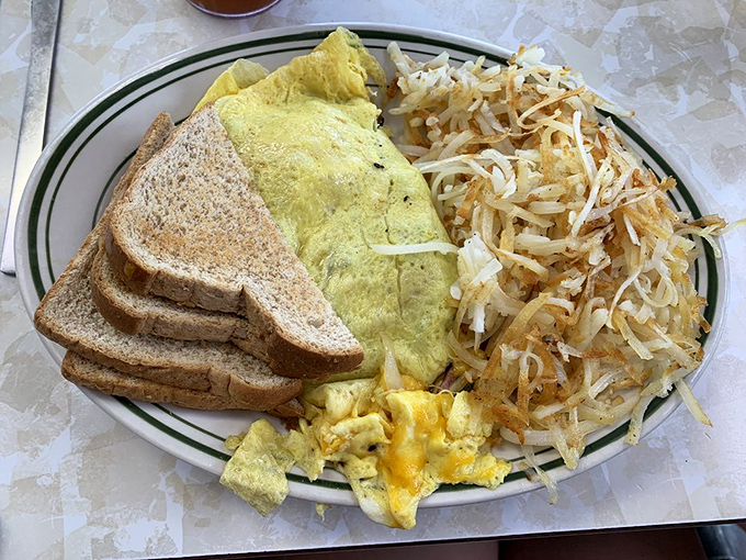 Behold, the breakfast of champions! This hearty omelet could fuel a marathon or a day of binge-watching your favorite shows.