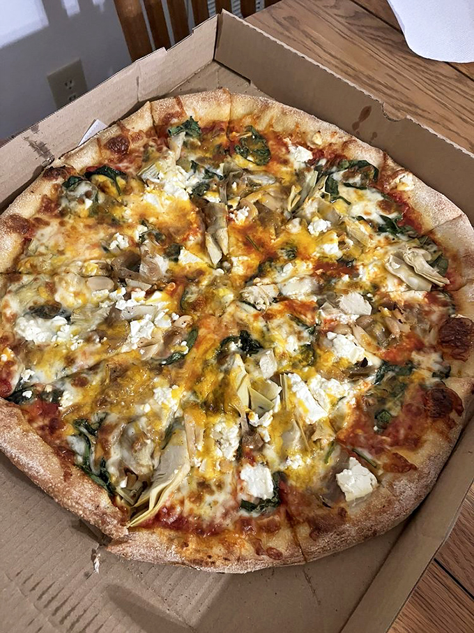 The Popeye pizza: Spinach so good, it'll make your biceps bulge! A leafy green dream that even Olive Oyl would fight for.