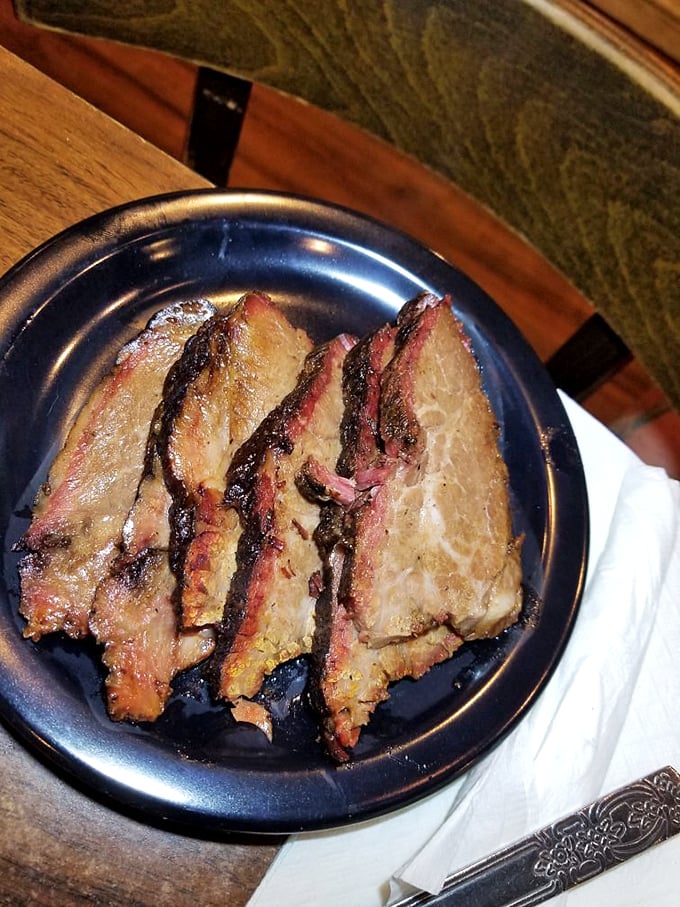 Behold the star of the show: tender, juicy pork that's been slow-dancing with smoke all day long.