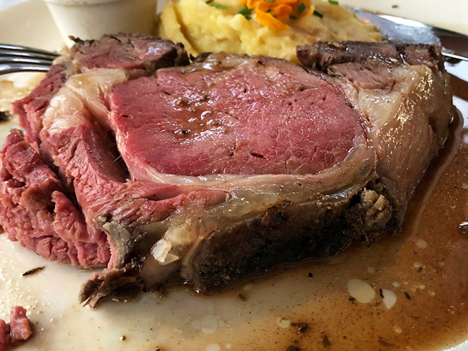Behold the prime rib in all its glory&mdash;a perfectly rosy interior with a seasoned crust that inspires poetry and ruins lesser beef experiences forever.