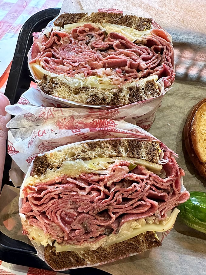 Ladies and gentlemen, I present to you the Eighth Wonder of the Culinary World: The Schmaltz Reuben. It's a skyscraper of deliciousness!