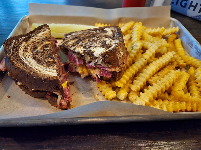 Behold, the Reuben in all its glory! This sandwich isn't just a meal, it's a religious experience for corned beef devotees.
