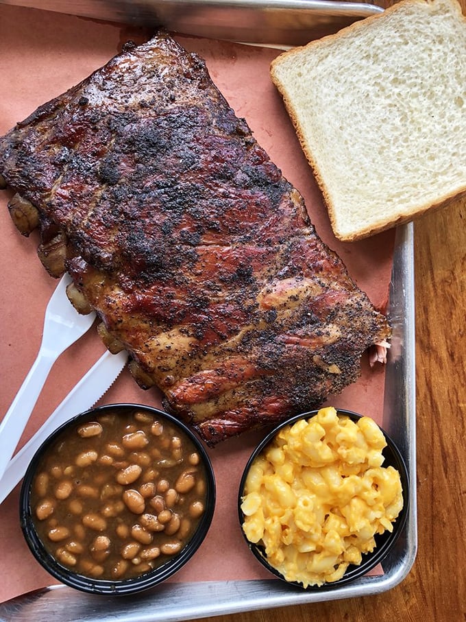 Holy smokes, would you look at those ribs! These bad boys are so tender, they practically fall off the bone with a stern glance.