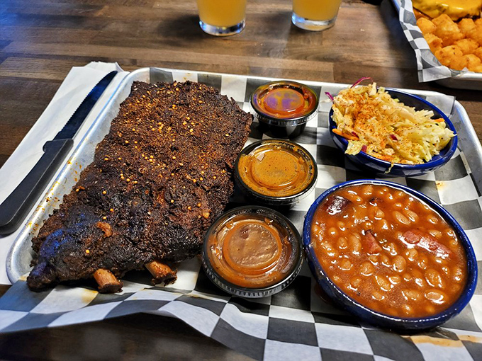 Behold, the holy trinity of barbecue! Ribs, brisket, and sides that'll make you want to hug the chef.