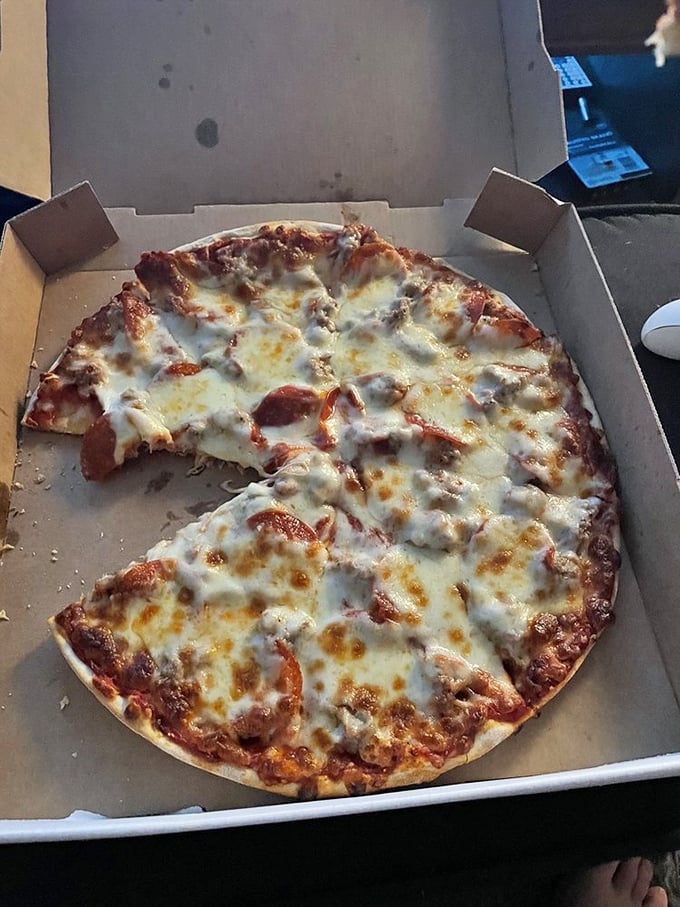 Sausage and pepperoni perfection! This pie could make even the strictest diet plans wave a white flag of delicious surrender.