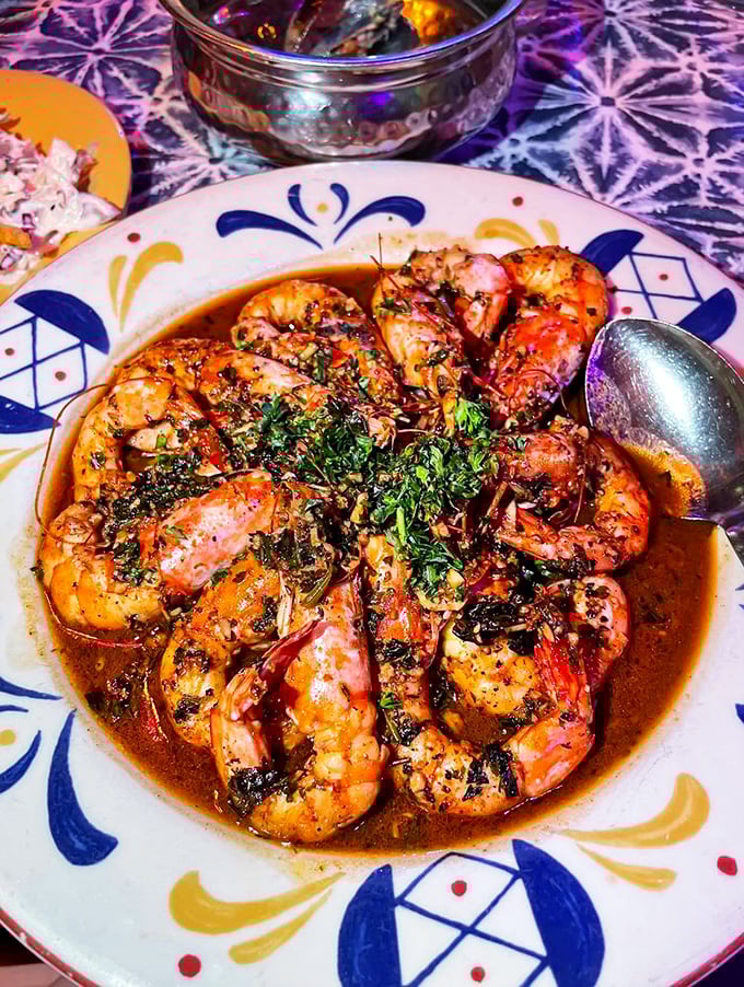 "Shrimp so good, you'll forget your table manners!" These plump beauties are swimming in a sauce that's begging to be sopped up with bread.