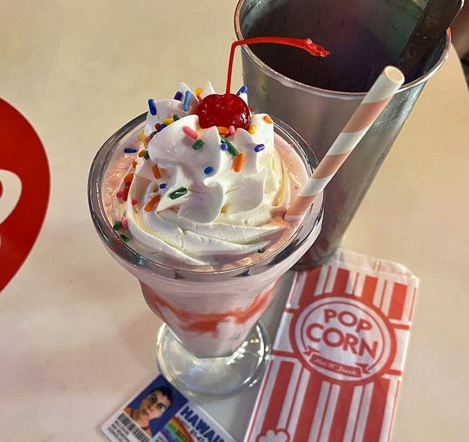 Holy moly, that's not just a milkshake&mdash;it's a work of art! Topped with enough whipped cream to make a cloud jealous.