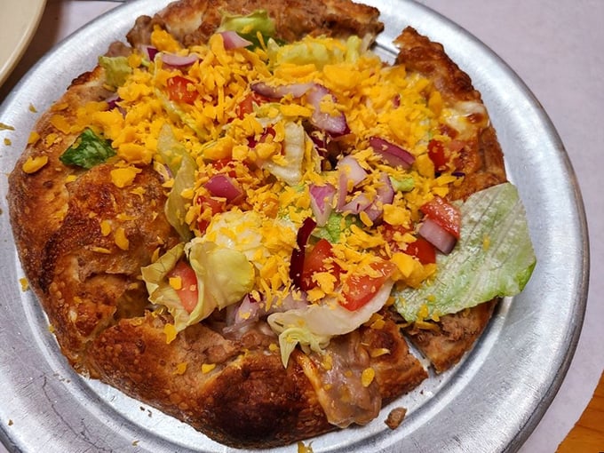 Taco Tuesday, meet Pizza Friday! This colorful creation is what happens when Tex-Mex and Italian cuisine have a delicious love child.